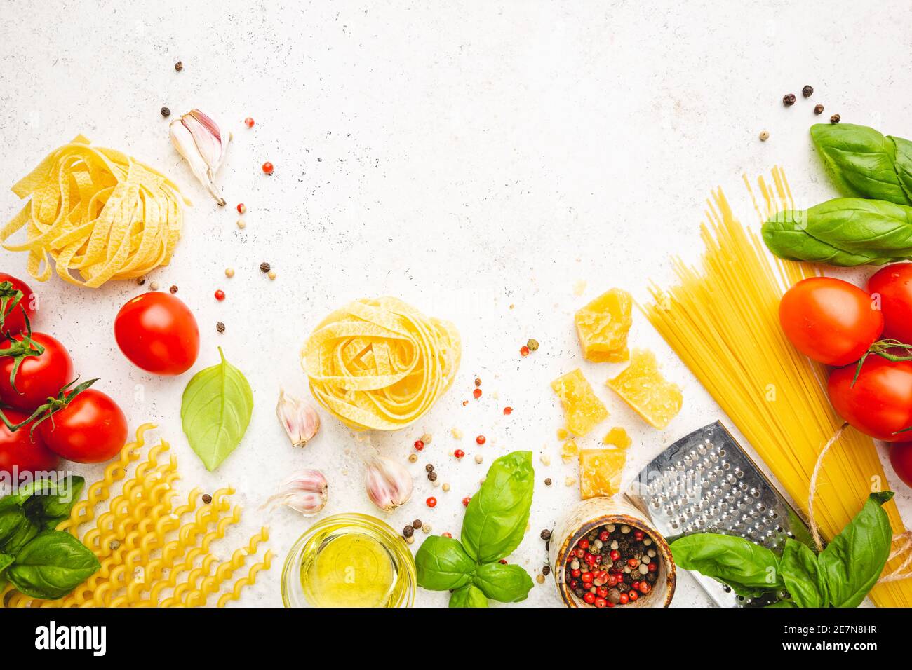 Pasta background. Several types of dry pasta with vegetables and herbs ...