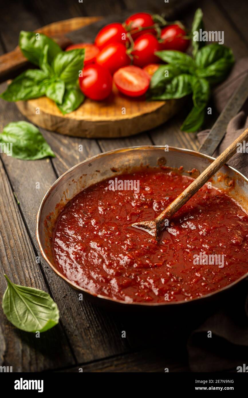 Classic homemade Italian tomato sauce with basil for pasta and pizza in ...