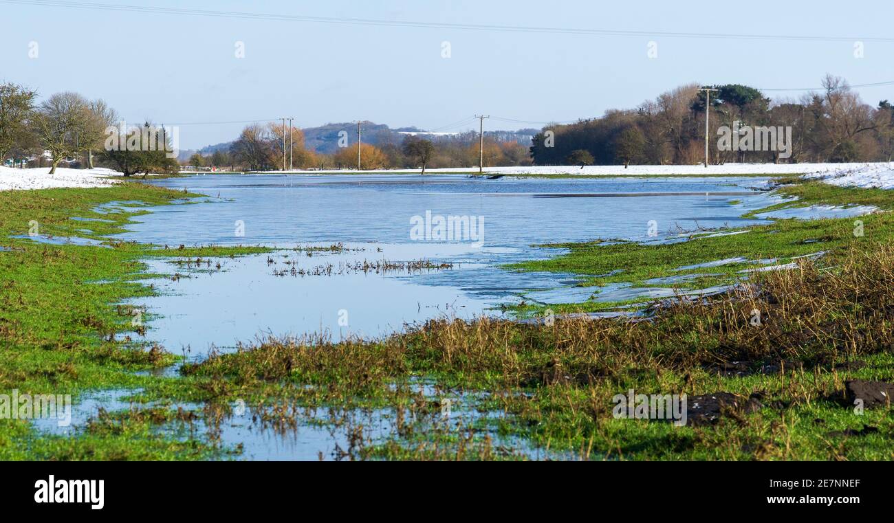 Flooded frozen farm field Stock Photo - Alamy