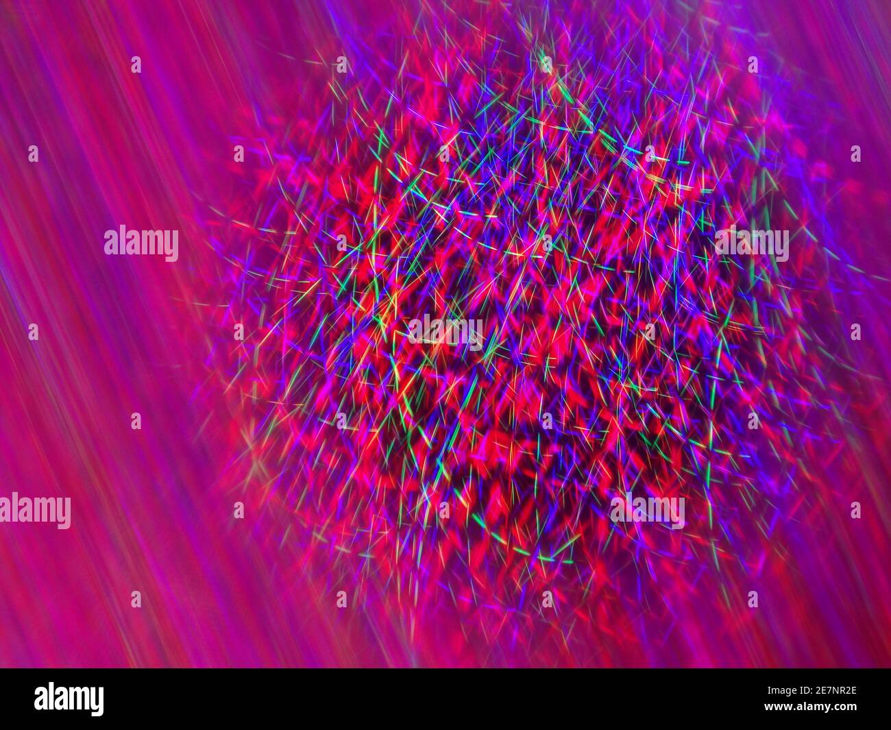 Colorful progressive rhythmic mixed light trails on a pink background ...