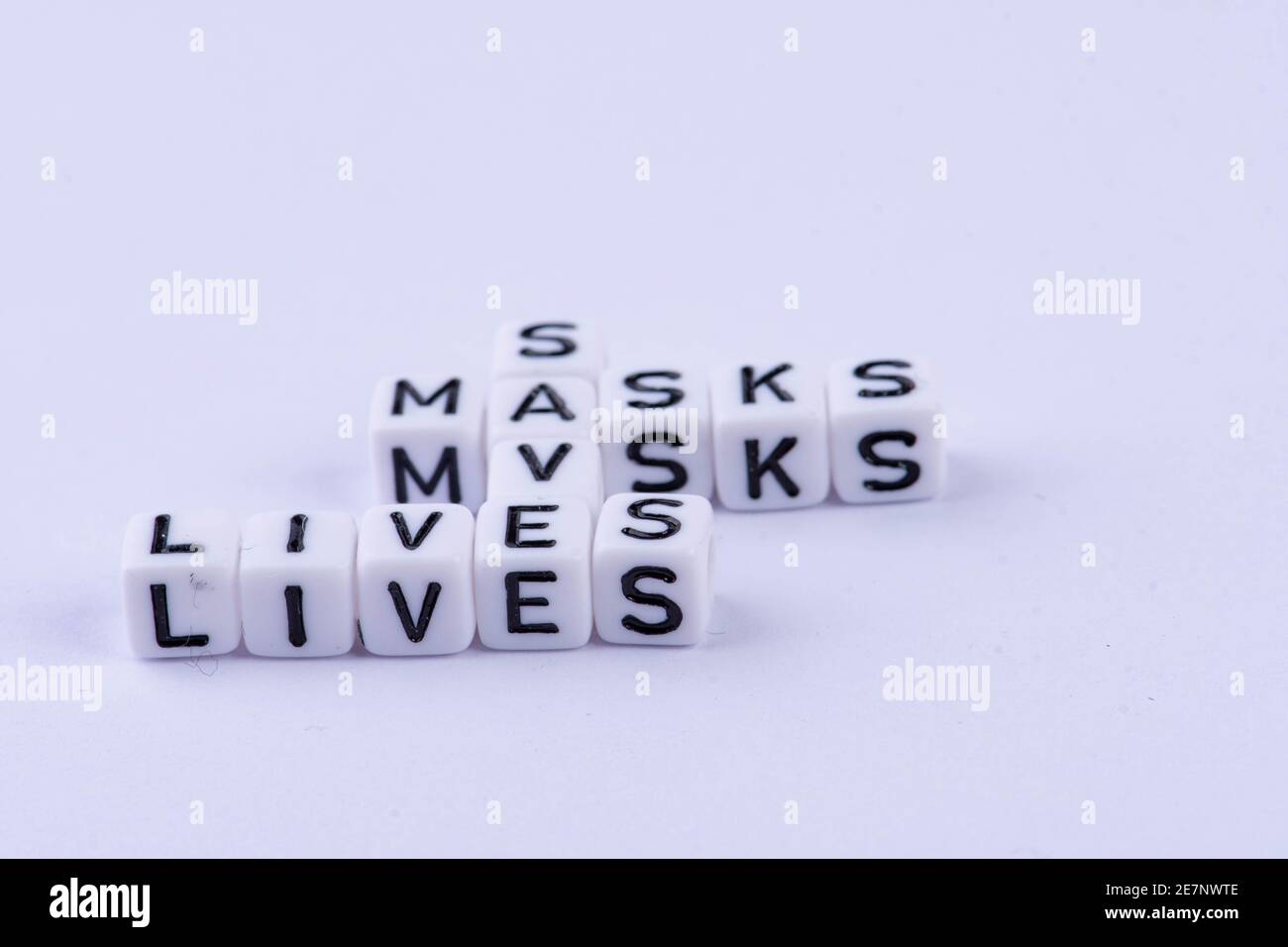 Letters with the word Mask Safe Lives Stock Photo - Alamy