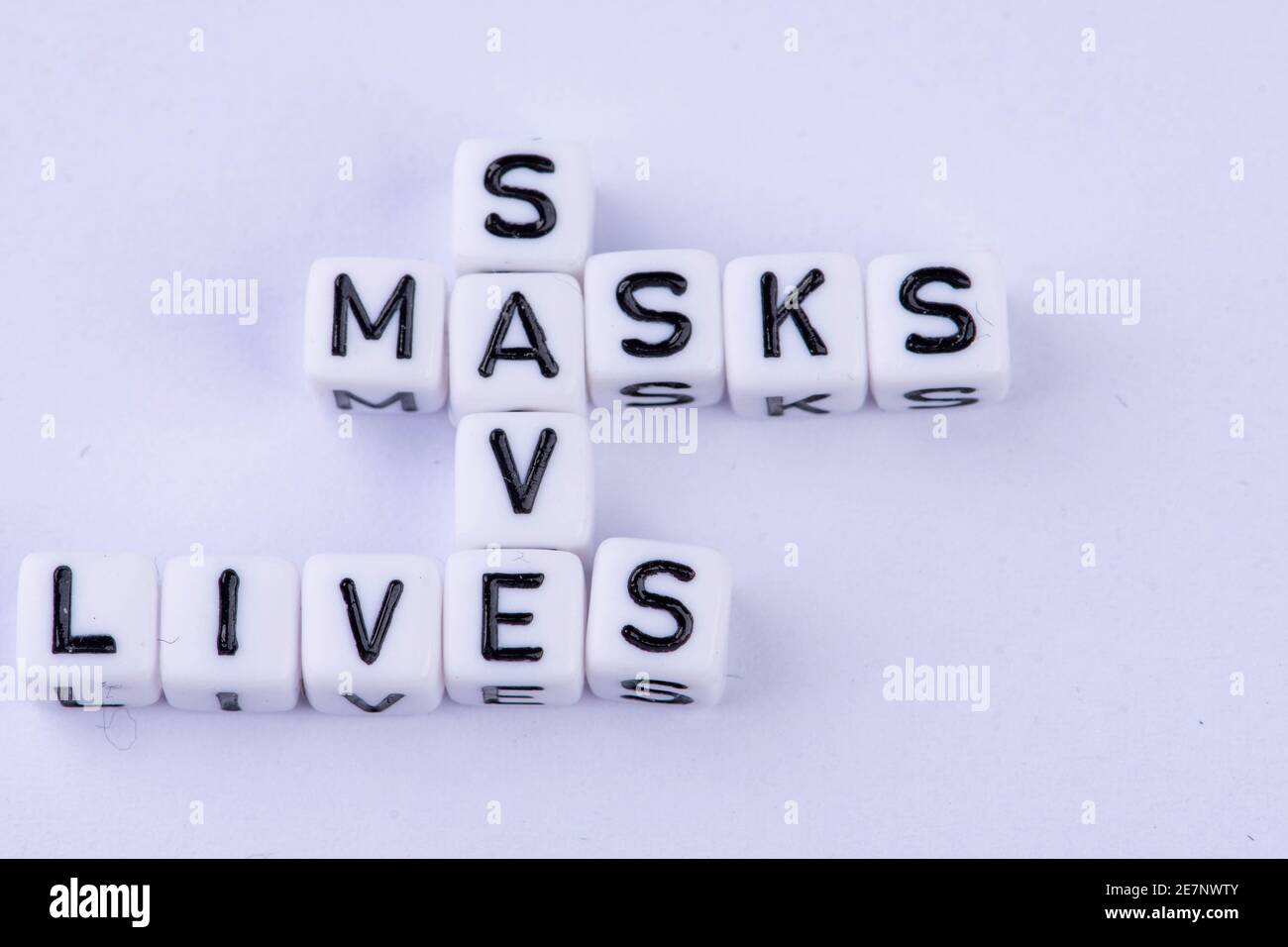 Letters with the word Mask Safe Lives Stock Photo - Alamy