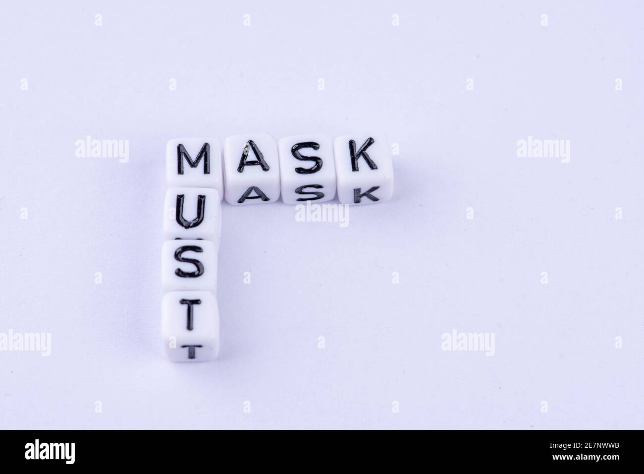 Letters with the word Mask Must Stock Photo - Alamy