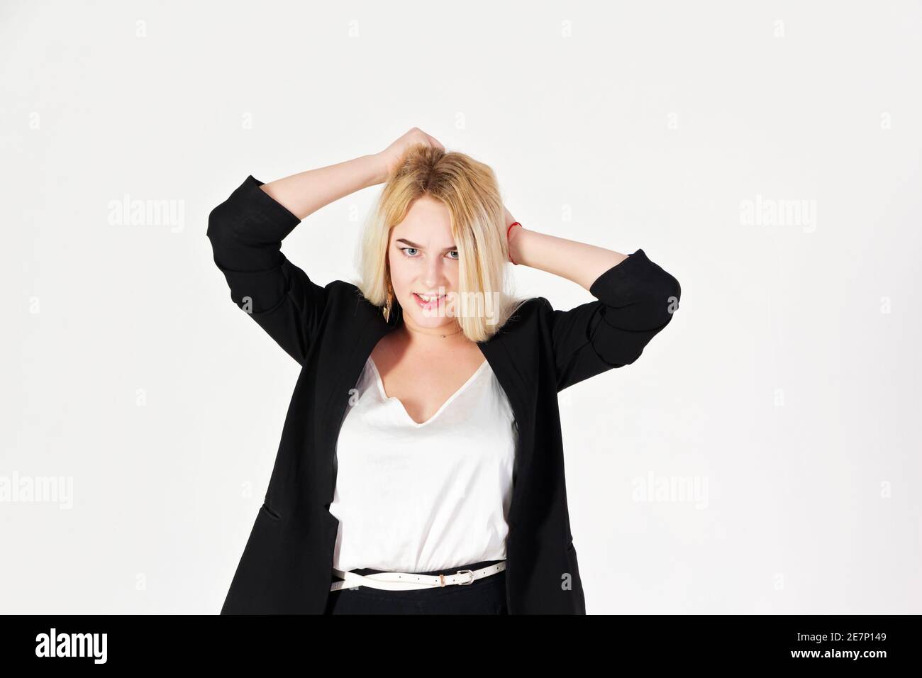 Studio portrait of blonde girl isolated on white background. Reference ...