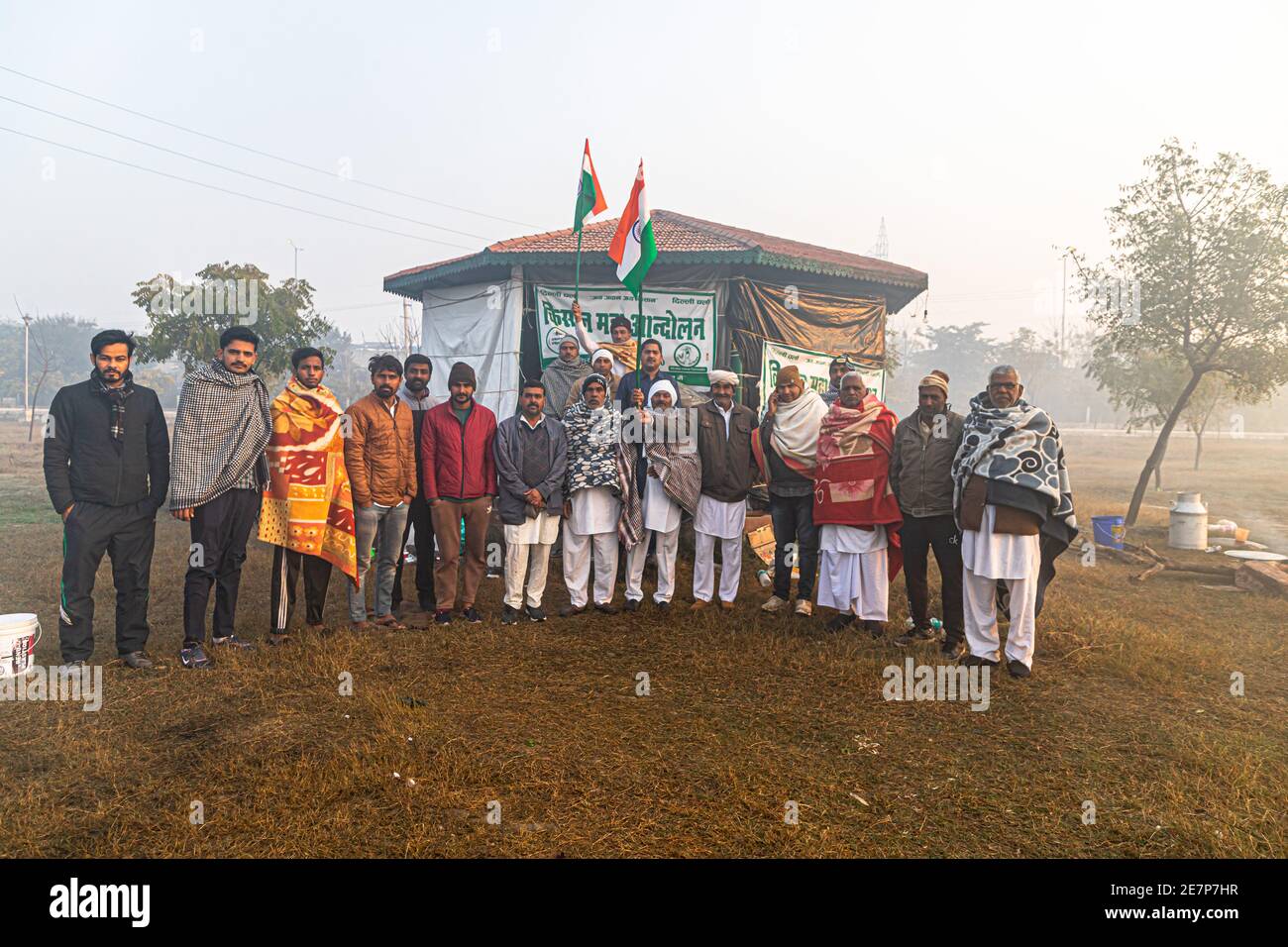 a group of farmers with indian flag during farmers protest at tikri ...