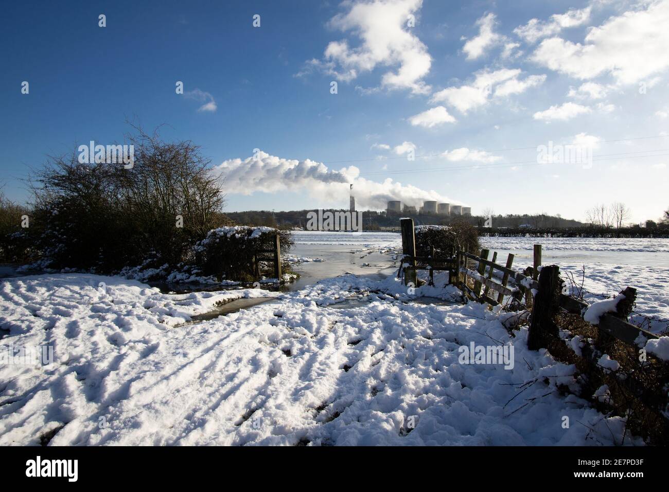 Entrance to a frozen muddy farm field Stock Photo - Alamy