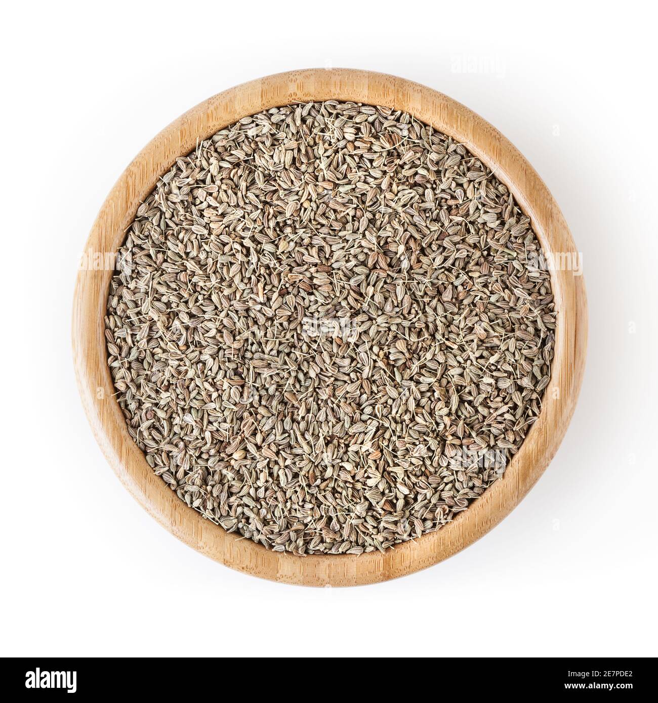 Anise seeds in wooden bowl isolated on white background with clipping ...