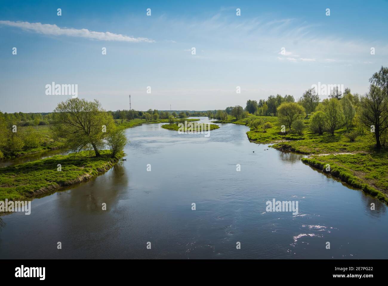 Summer rural landscape with river and blue sky background Stock Photo ...