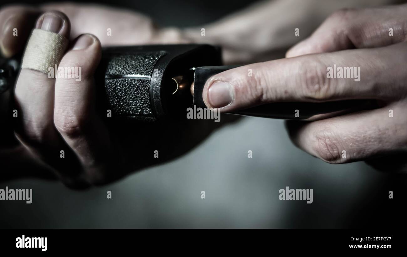 Chambering a round hi-res stock photography and images - Alamy
