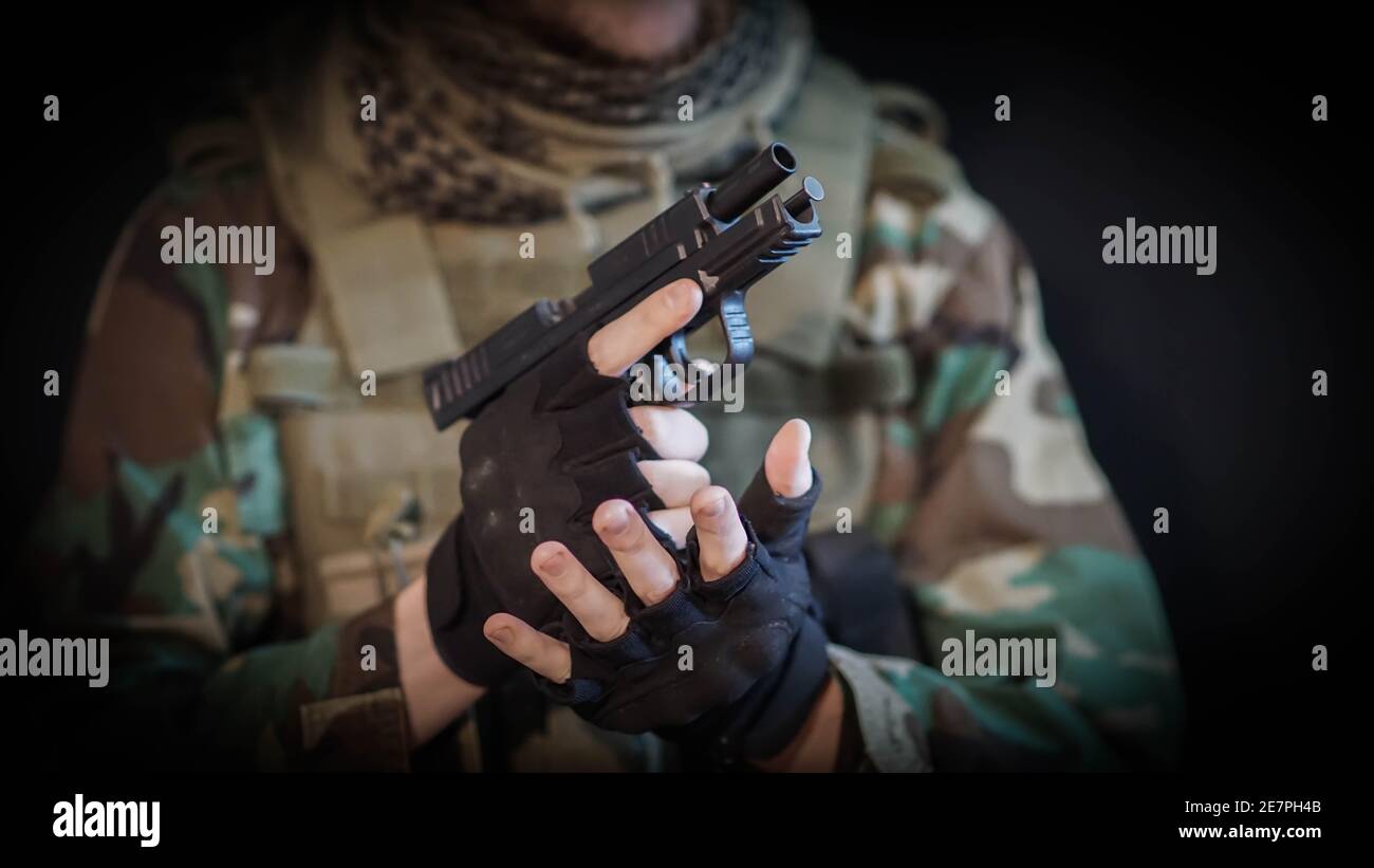 Loading a magazine loading gun handgun magazine hi-res stock ...