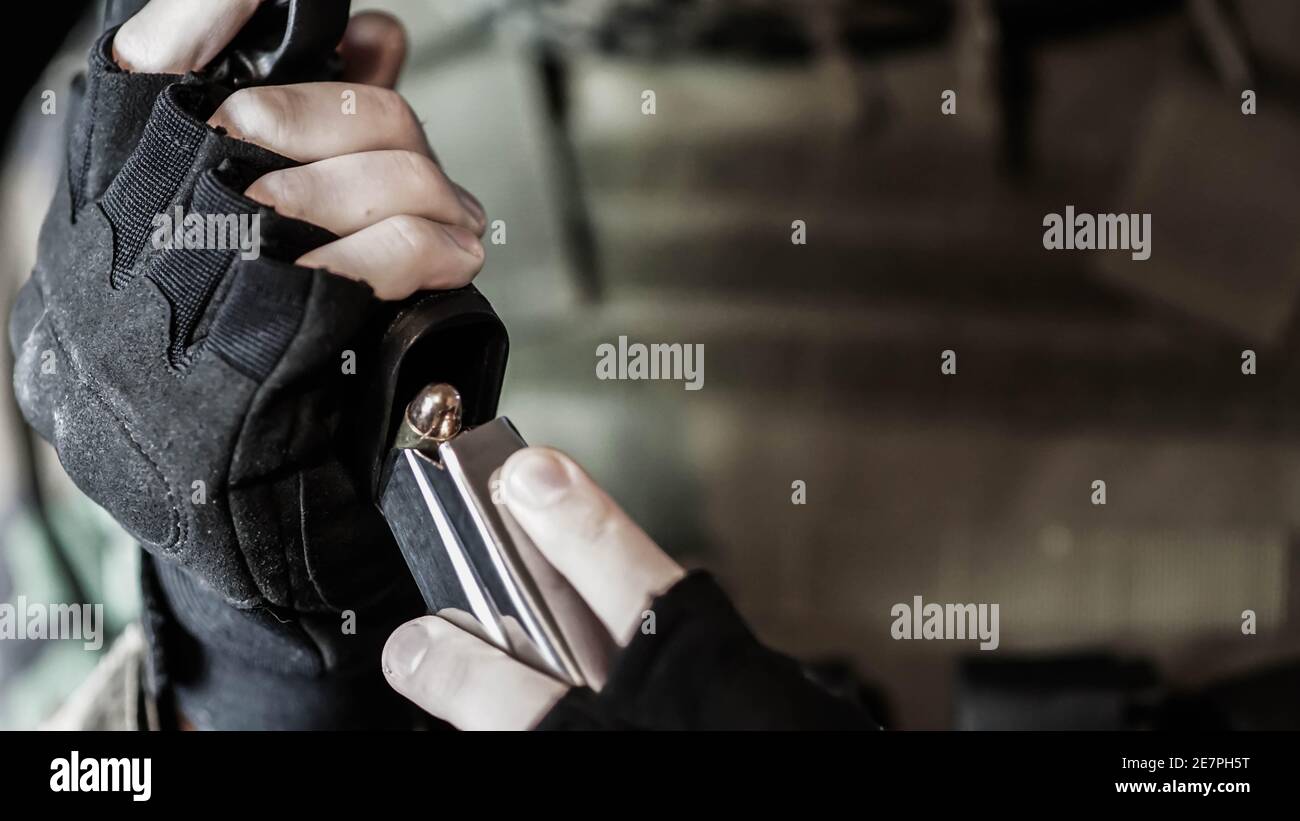 Loading a magazine loading gun handgun magazine hi-res stock ...