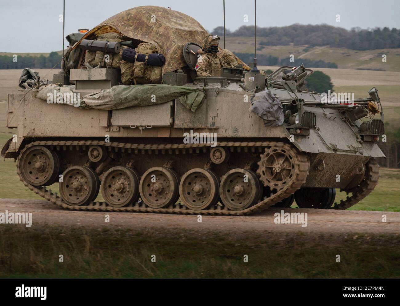 FV430 in motion, fully loaded with troop bergens under a tarpaulin ...