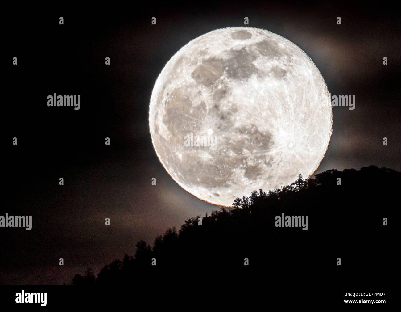 Planet rising over mountains hi-res stock photography and images - Alamy