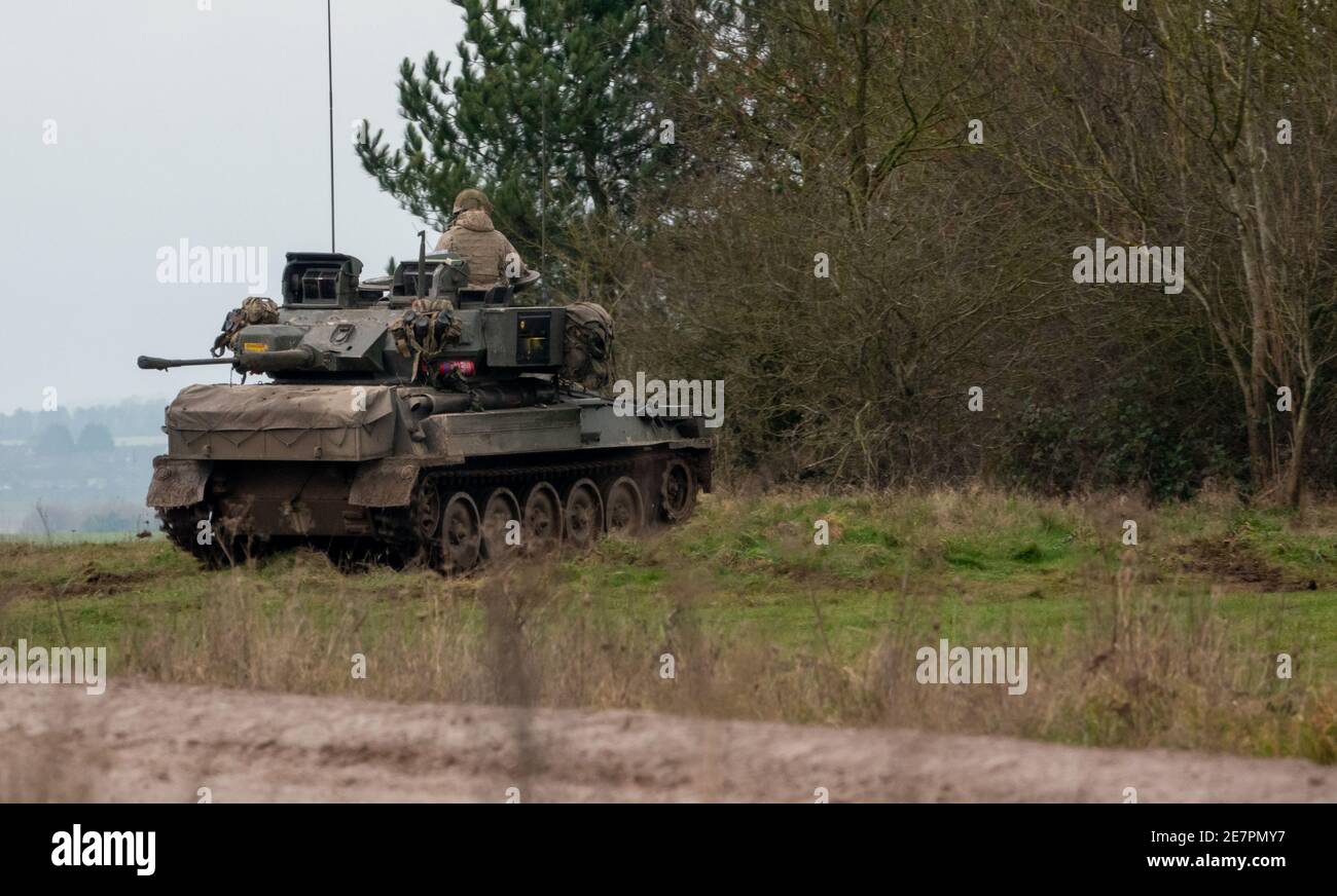 british army armed Scimitar light armored vehicle on maneuvers and ...