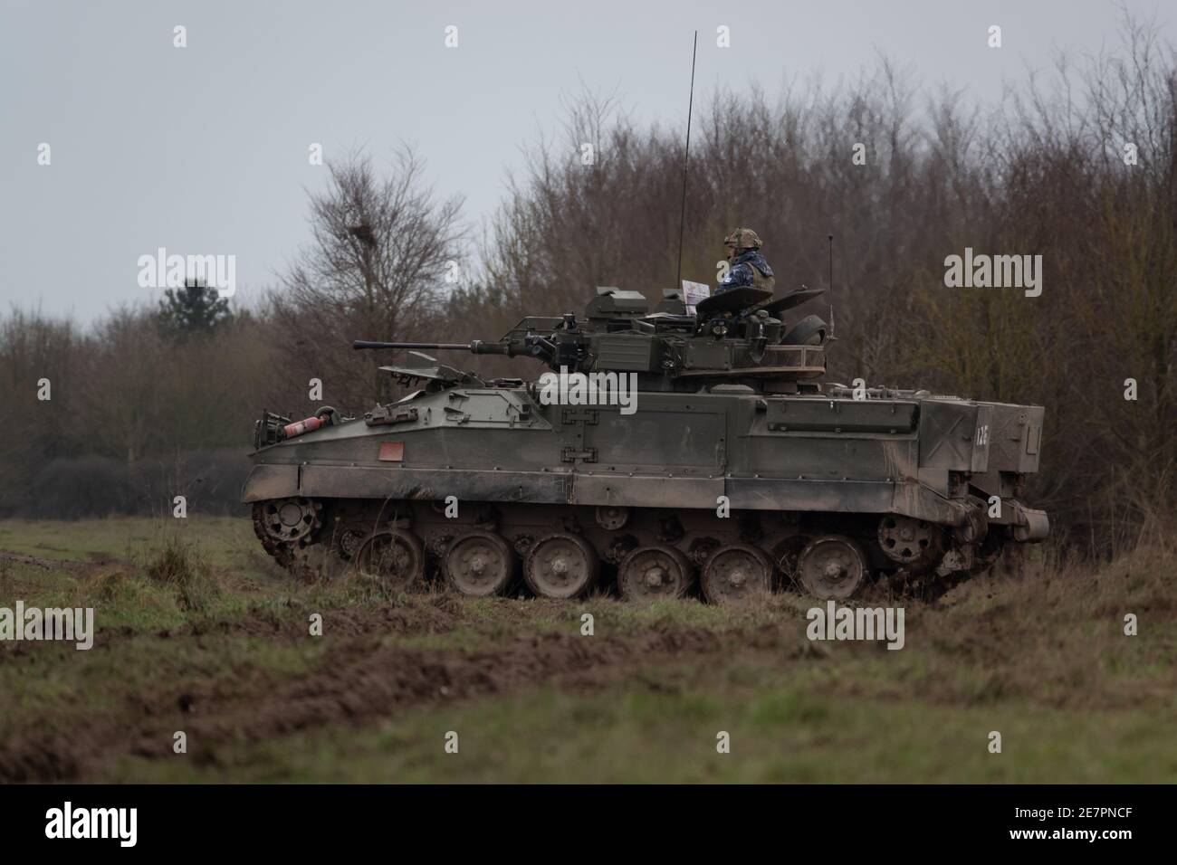 british army warrior tank armoured vehicle on manoeuvers in a ...