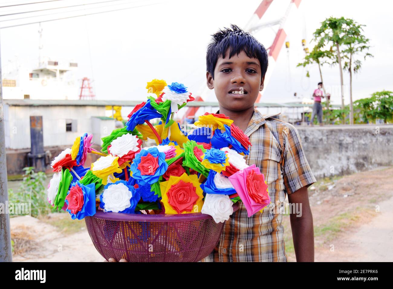 Child selling flowers hi-res stock photography and images - Alamy