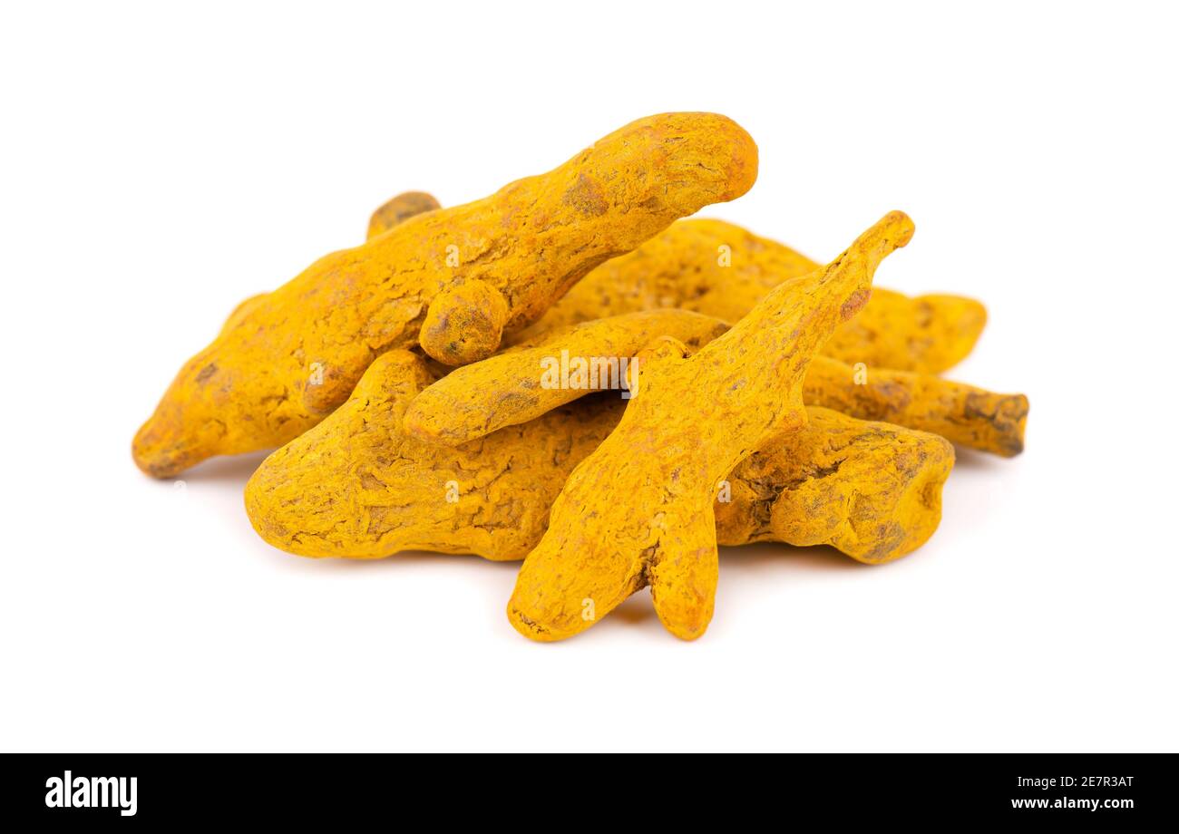 Dry turmeric root isolated on white background. Curcuma longa linn ...