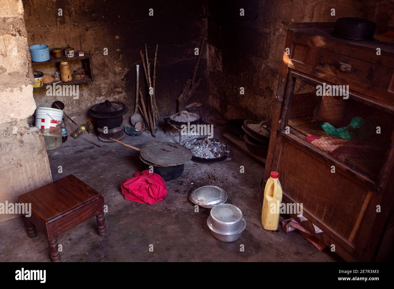 African kitchen interior with hearth and stove. Interior of the modest ...