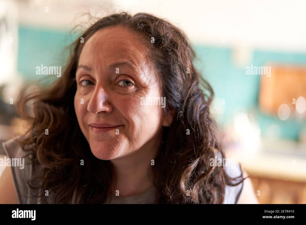 One caucasian woman inside home light hi-res stock photography and ...