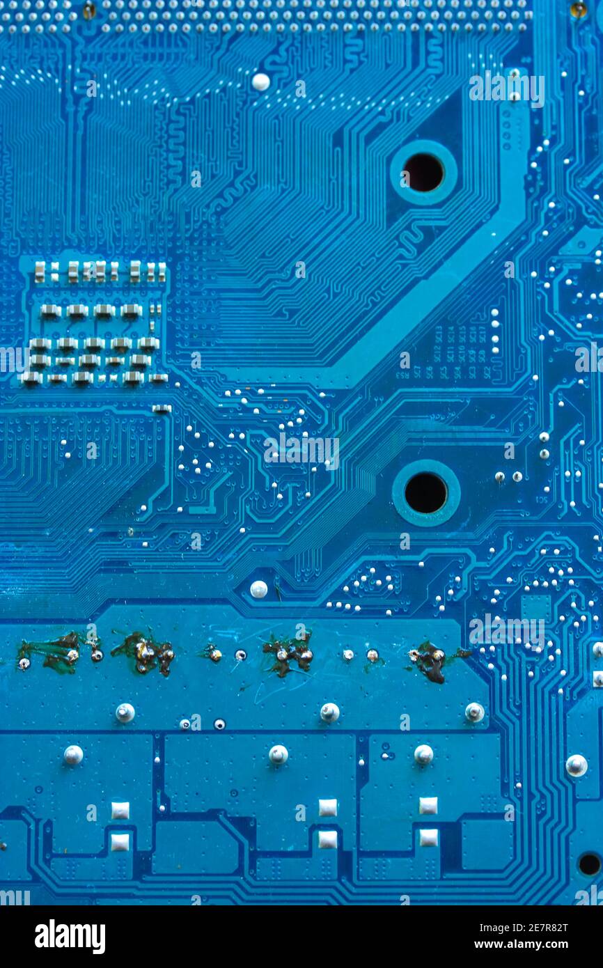 The reverse side of the microboard on a blue background. Electronic ...