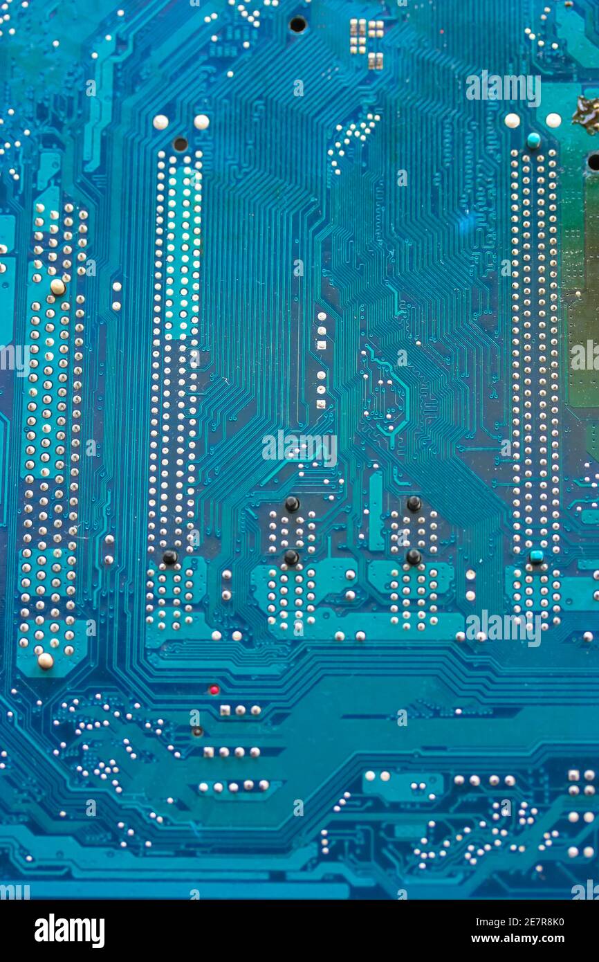 The reverse side of the microboard on a blue background. Electronic ...