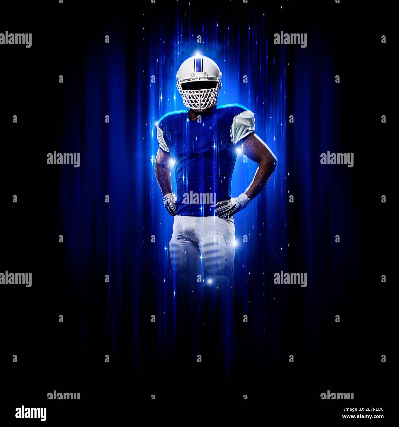 Football Player player with a superhero pose wearing a blue uniform on ...