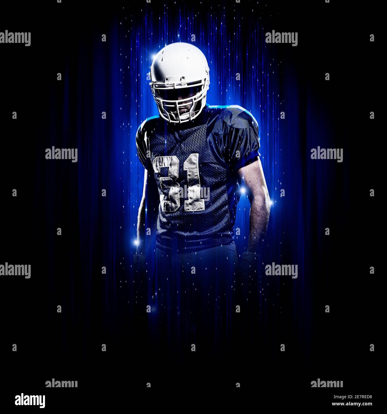Football Player player with a superhero pose wearing a blue uniform on ...