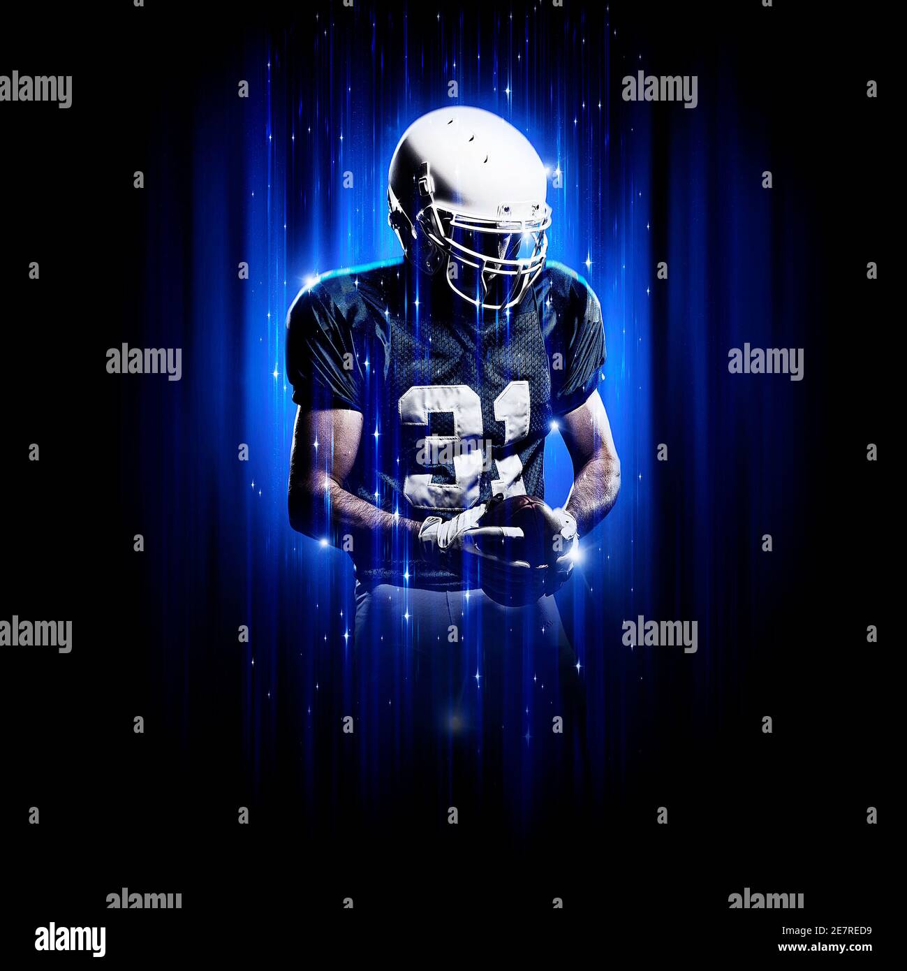 Football Player player with a superhero pose wearing a blue uniform on ...
