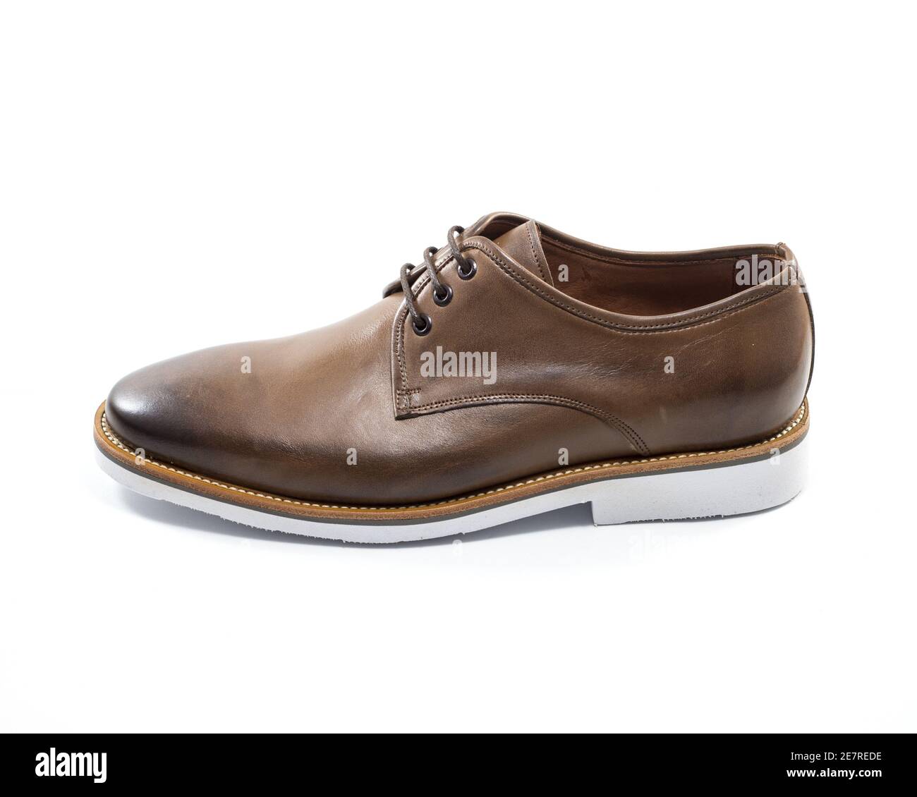 A closeup of brown classic men shoes isolated on white background Stock ...