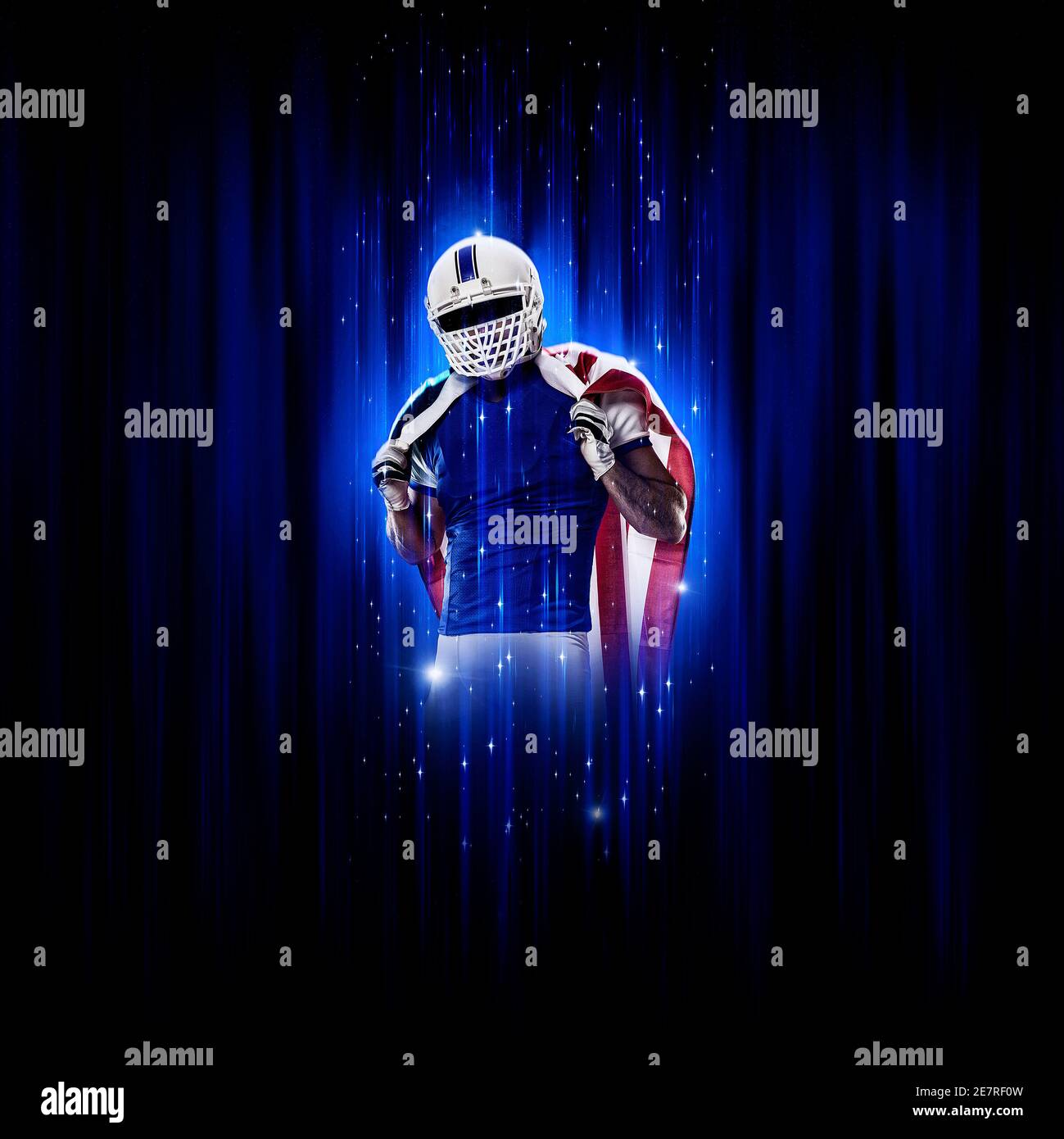 Football Player player with a superhero pose wearing a blue uniform on ...