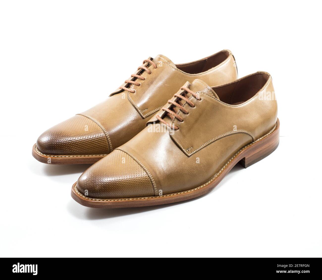 Pair of brown leather men shoes isolated on white background Stock ...