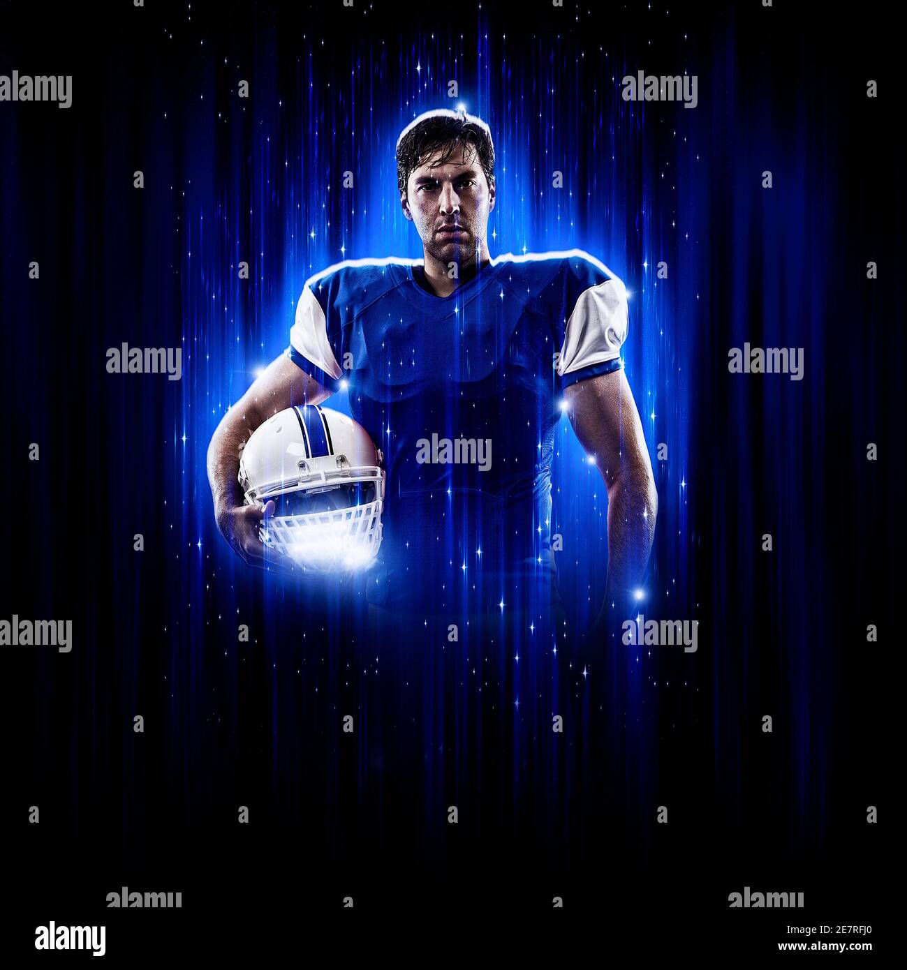 Football Player player with a superhero pose wearing a blue uniform on ...