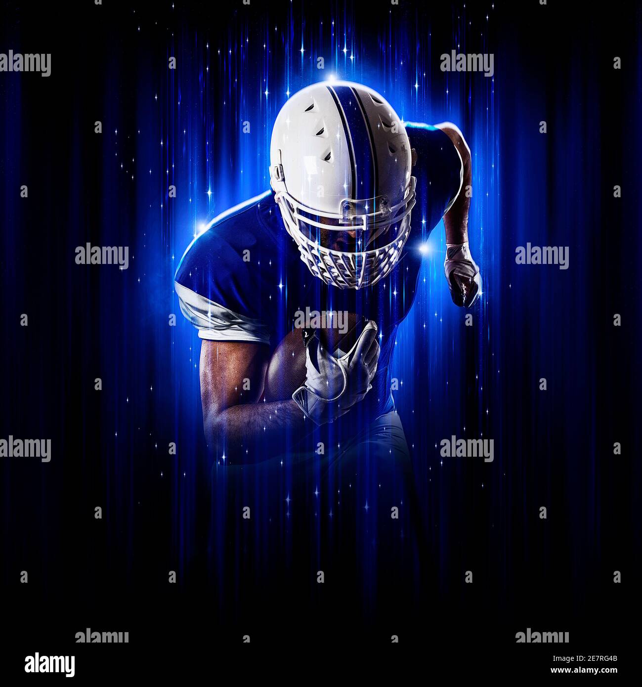 Football Player player with a superhero pose wearing a blue uniform on ...