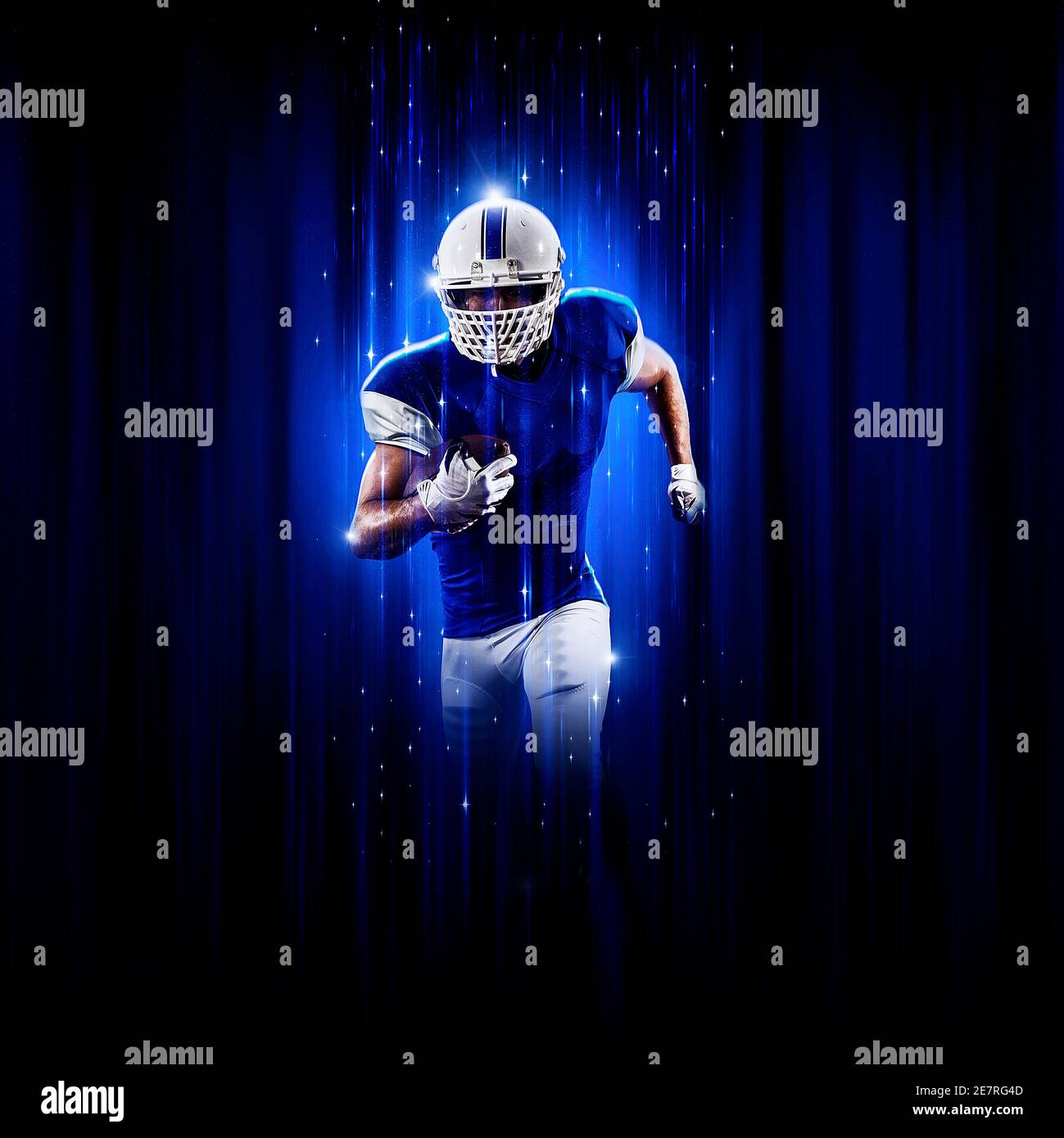 Football Player player with a superhero pose wearing a blue uniform on ...