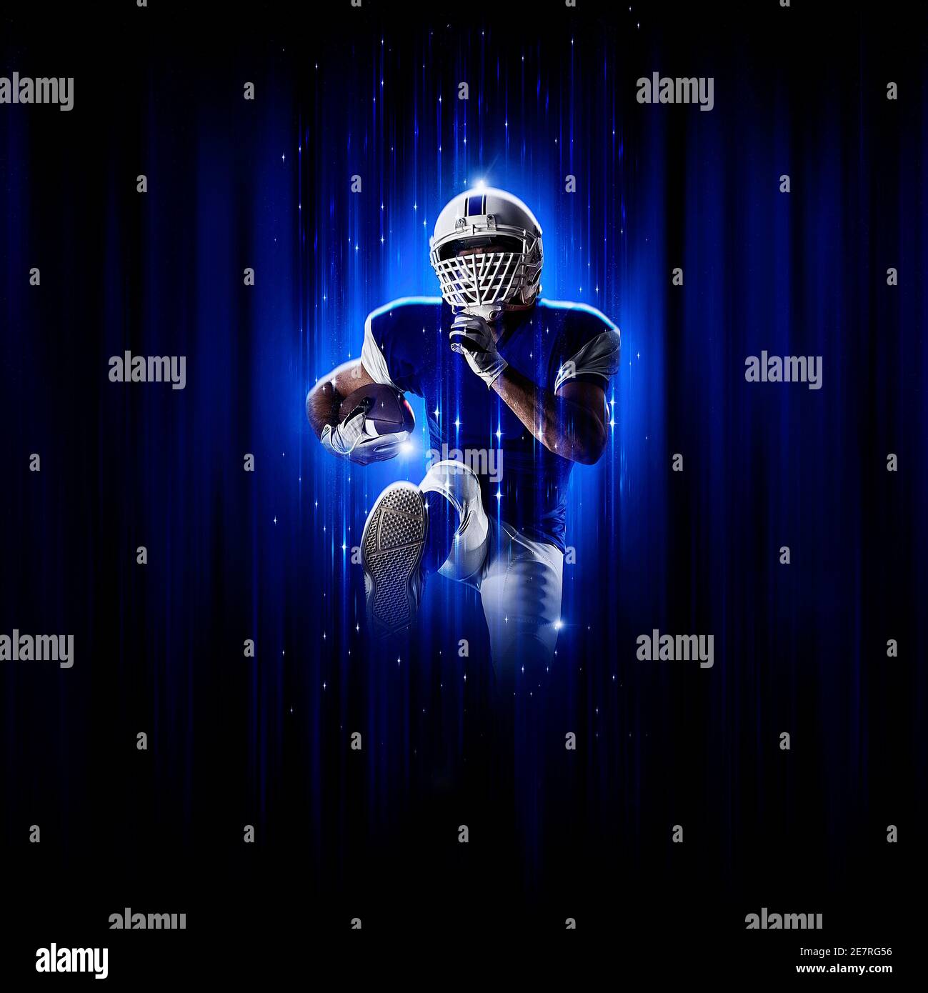 Football Player player with a superhero pose wearing a blue uniform on ...