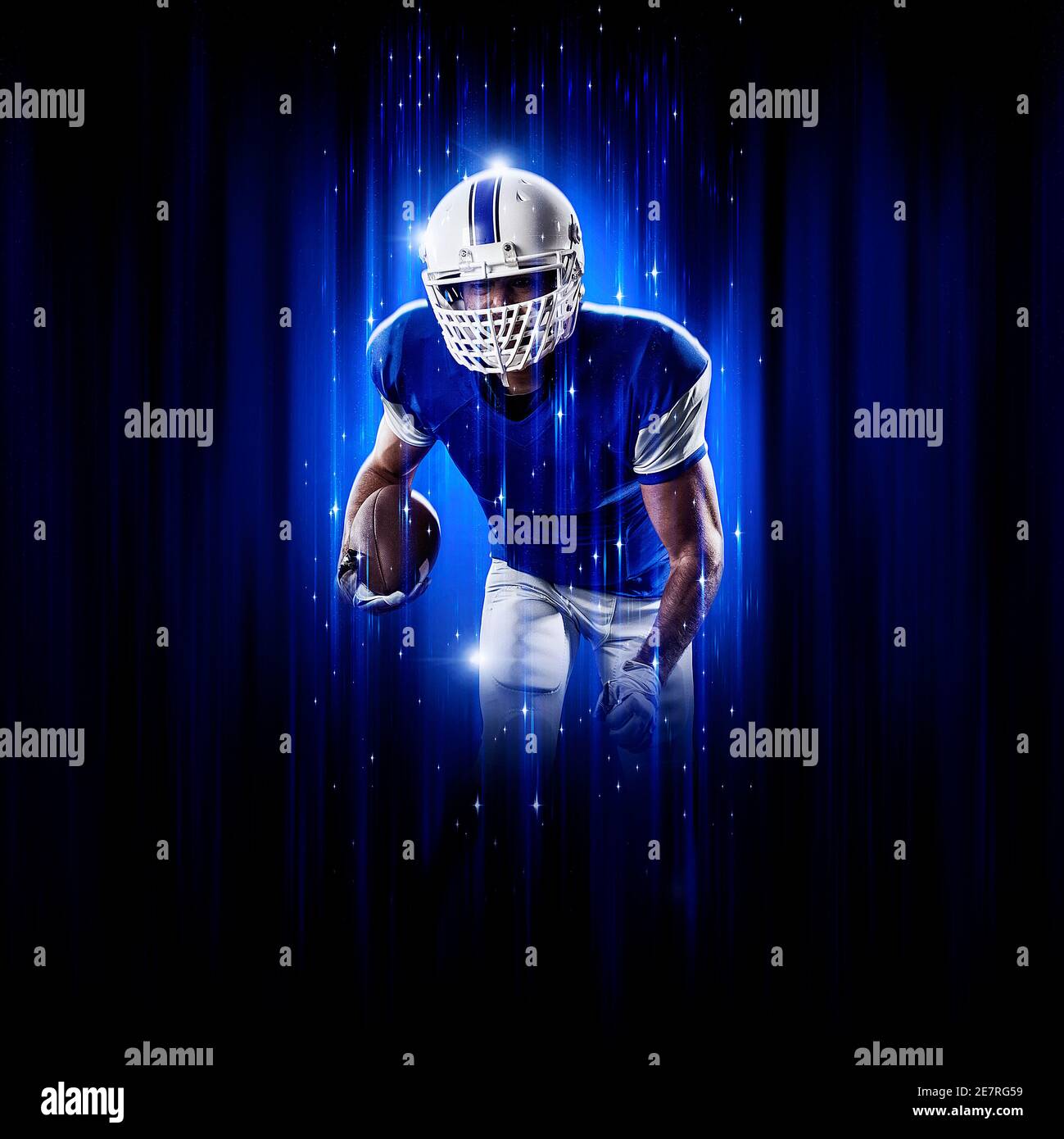 Football Player player with a superhero pose wearing a blue uniform on ...