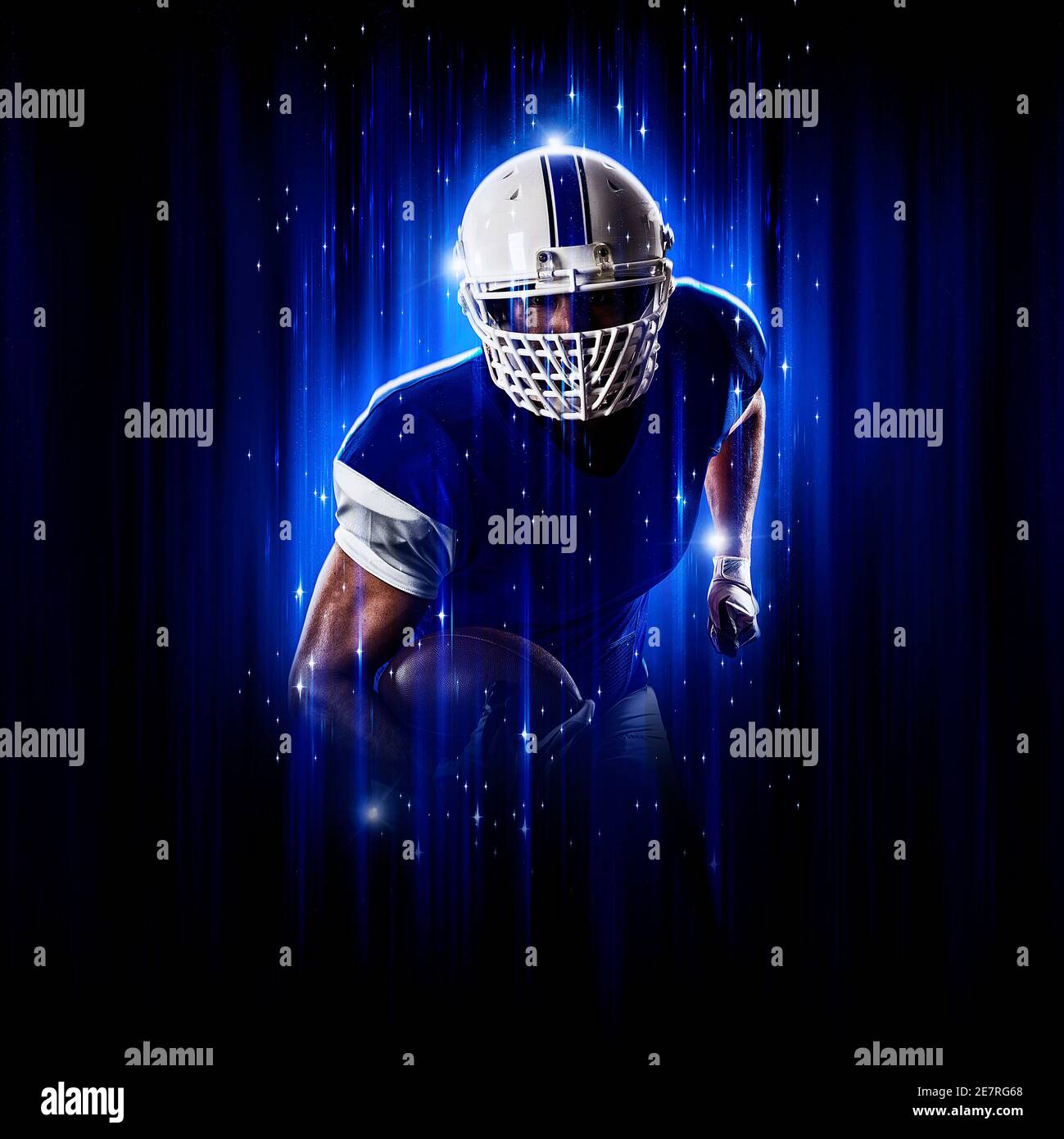 Football Player player with a superhero pose wearing a blue uniform on ...