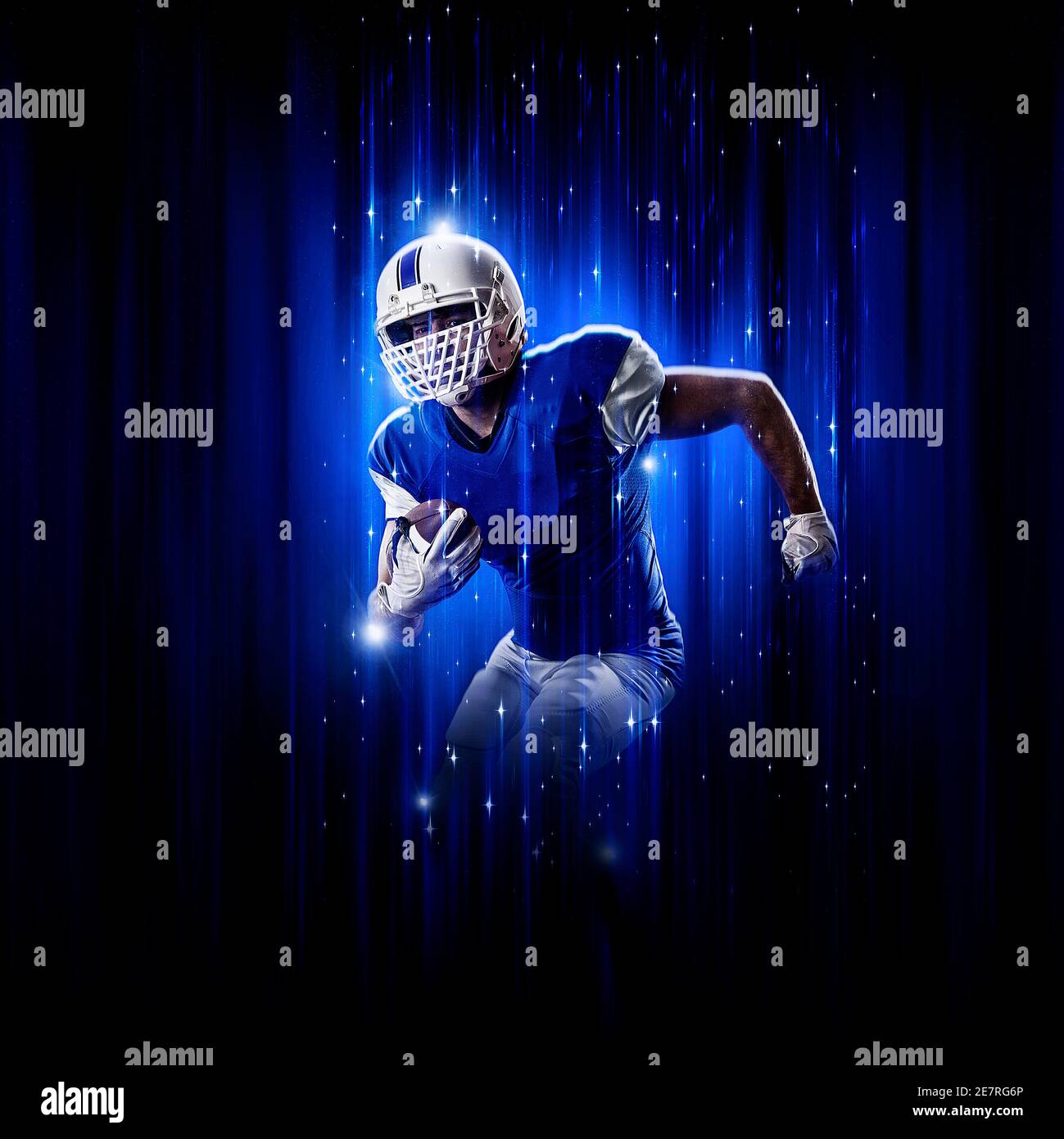 Football Player player with a superhero pose wearing a blue uniform on ...