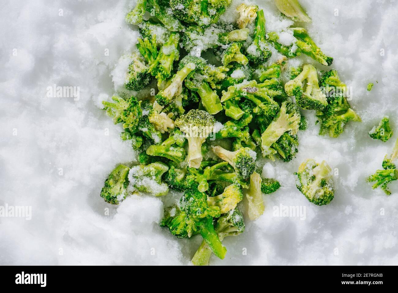 Top view of green broccoli laid frozen on a grinded ice Stock Photo - Alamy