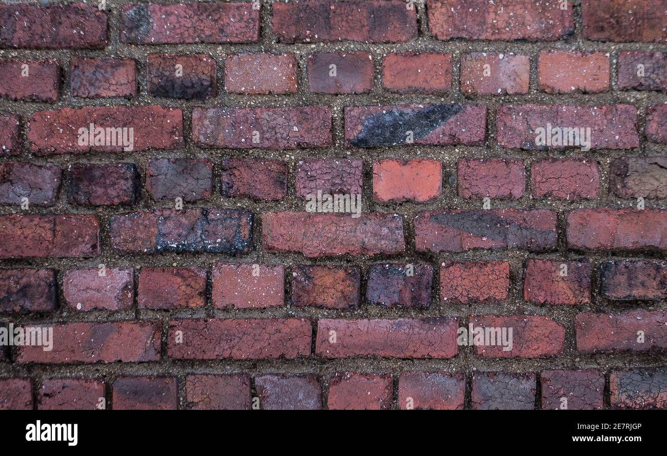 old rustic red brick wall with amazing colours Stock Photo - Alamy