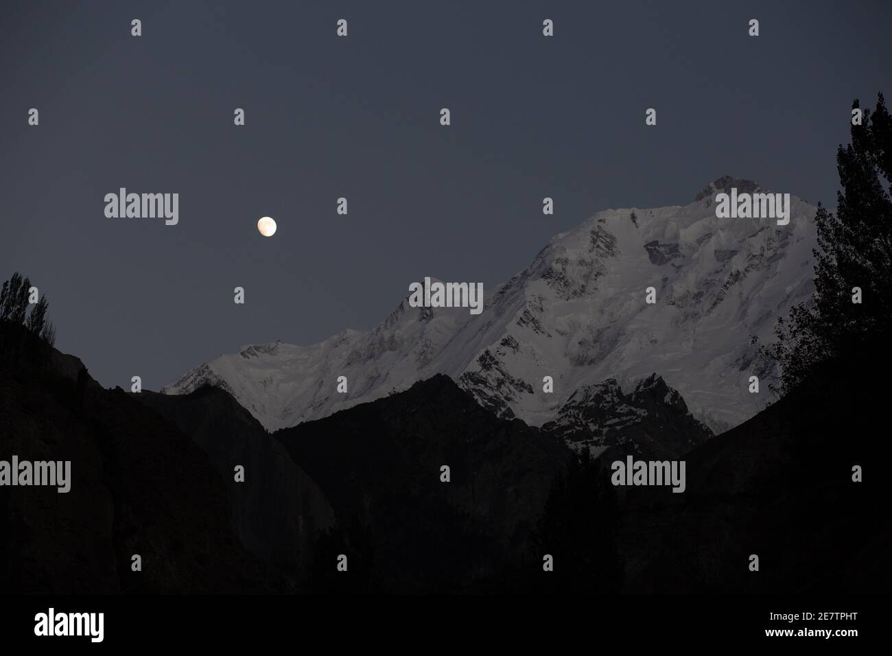 Moonlight over Rakaposhi mountain peak at night, Hunza Nagar Valley ...