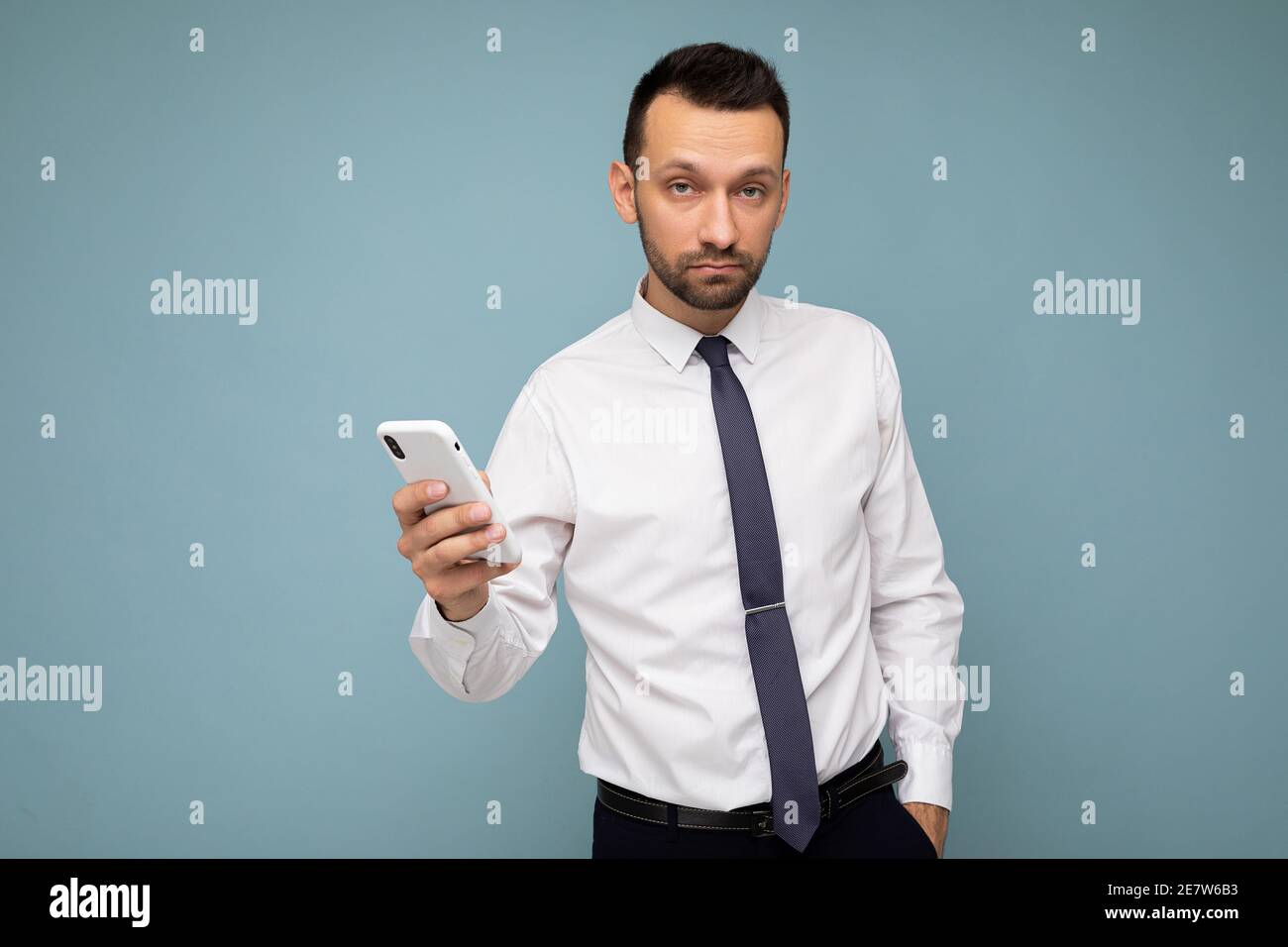 Handsome good looking brunet unshaven man with beard wearing casual ...