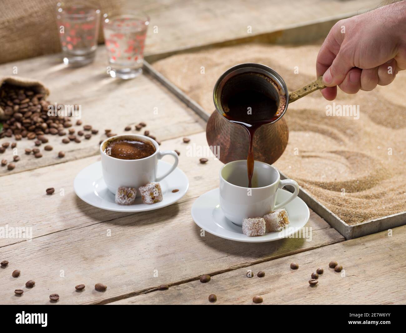 Traditional Turkish coffee. Cooking method in hot sand Stock Photo - Alamy