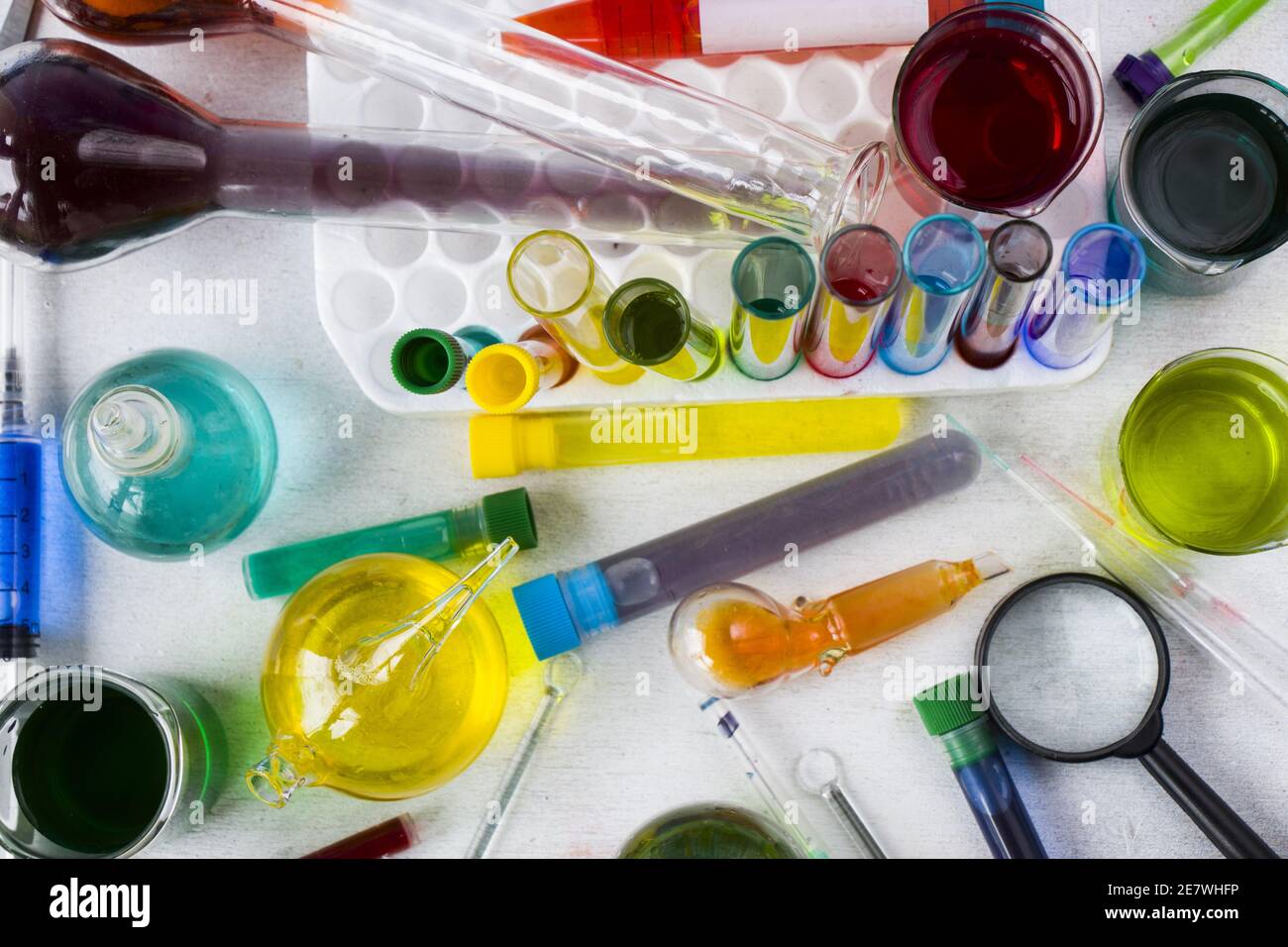 Top view shot of laboratory reagents with colorful liquid Stock Photo ...