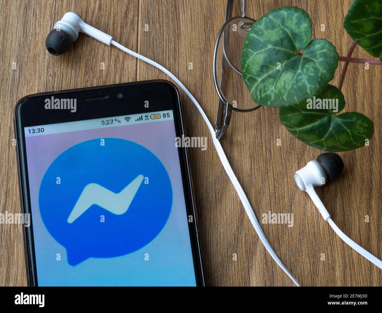 In this photo illustration a Messenger logo is seen displayed on a ...