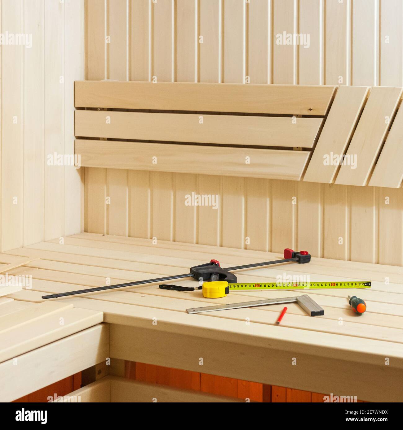 Sauna construction in progress. Wooden walls and benches Stock Photo ...