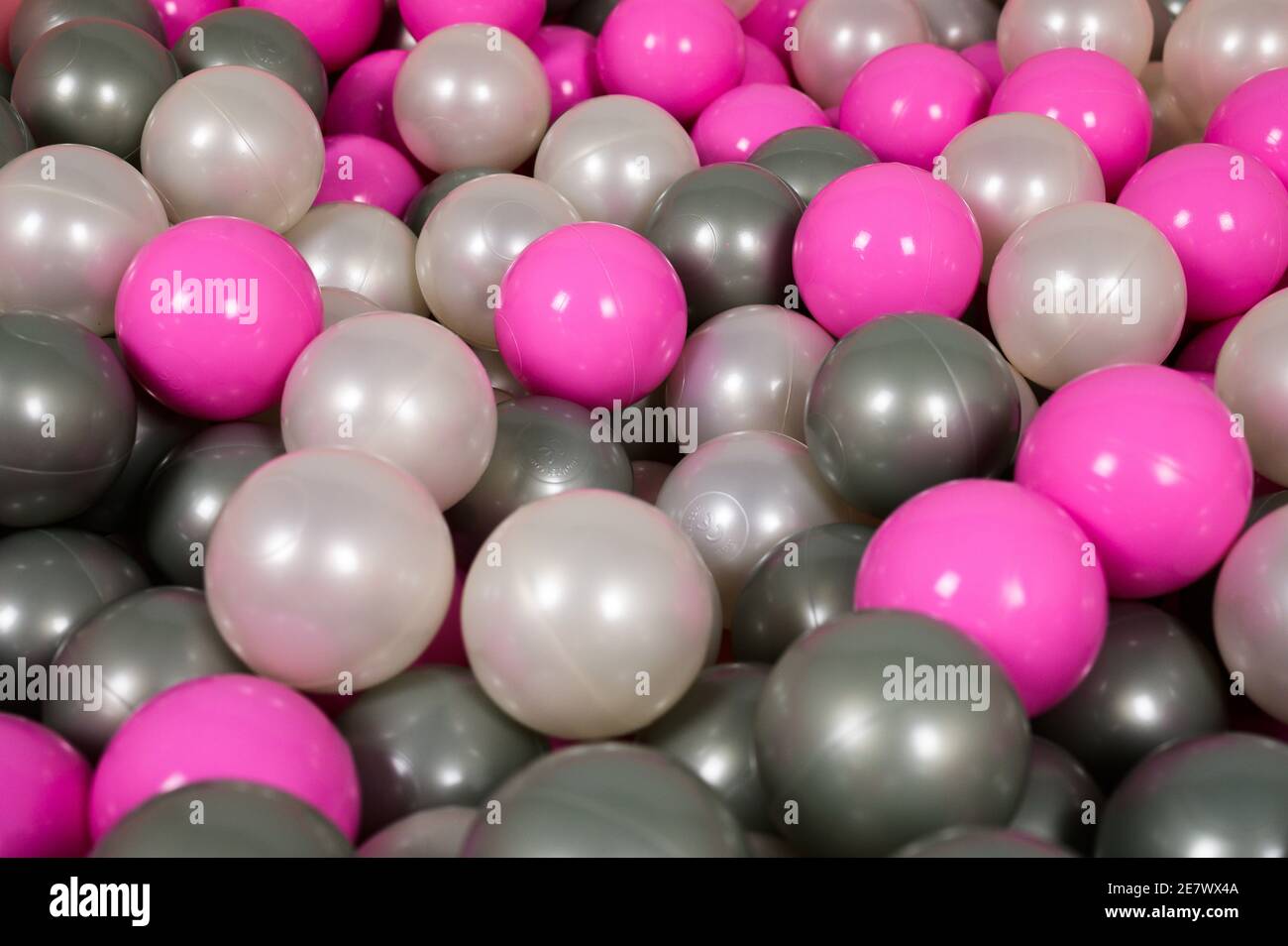 Top view of pink dry pool balls one on another Stock Photo - Alamy