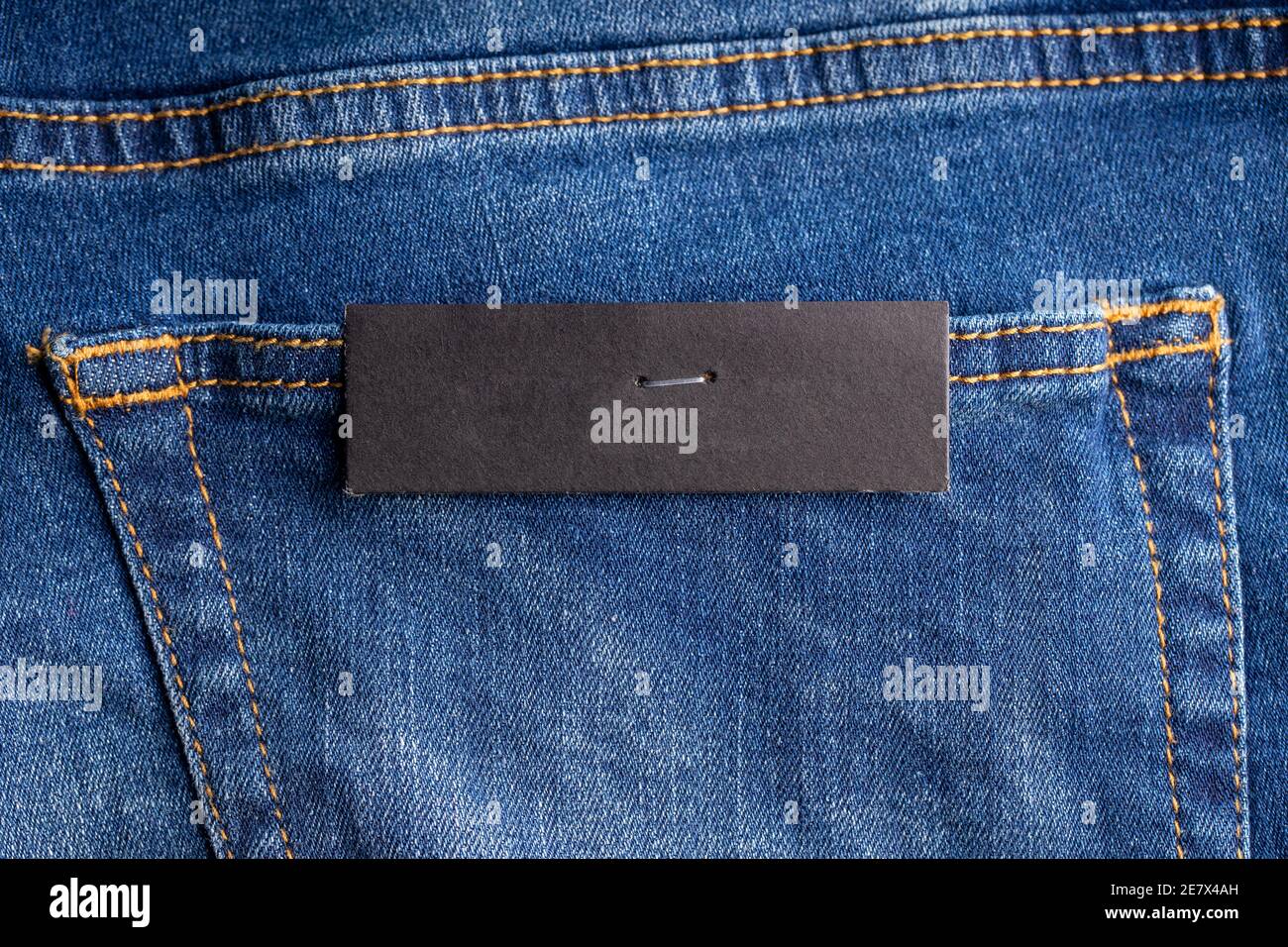 price tag on jean back pocket. empty mockup. background backdrop Stock ...