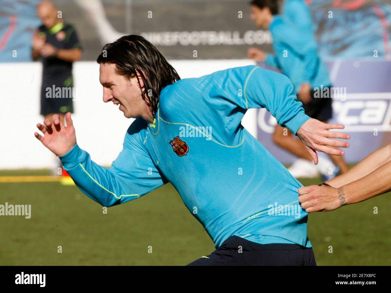 Barcelonas lionel messi attends training hi-res stock photography and ...