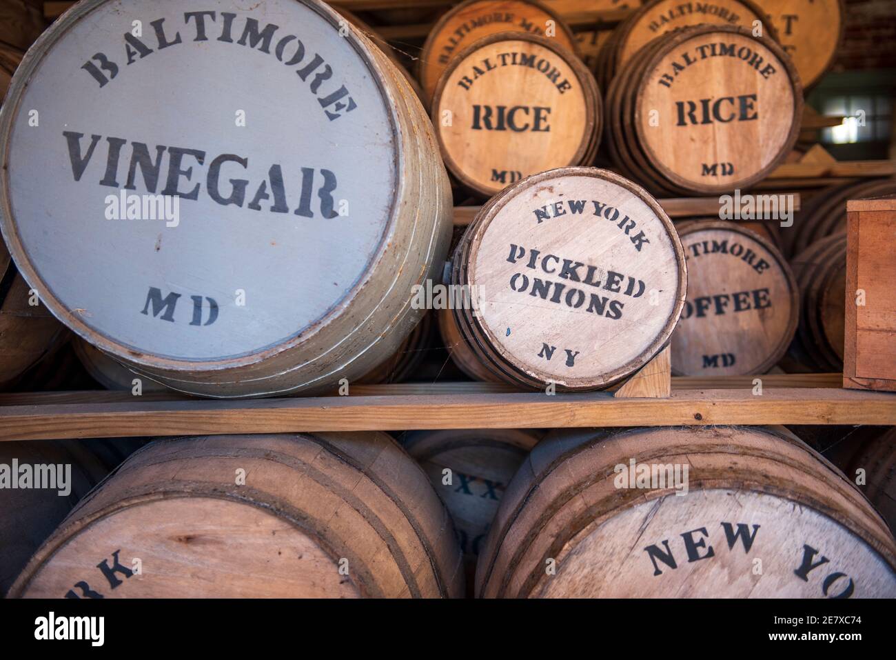 Barrels labeled "vinegar, salt beef, rice, flour, salt, molasses ...